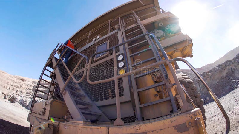 Giant Mining Truck Transporting Minerals in an Open Pit Mine Stock ...