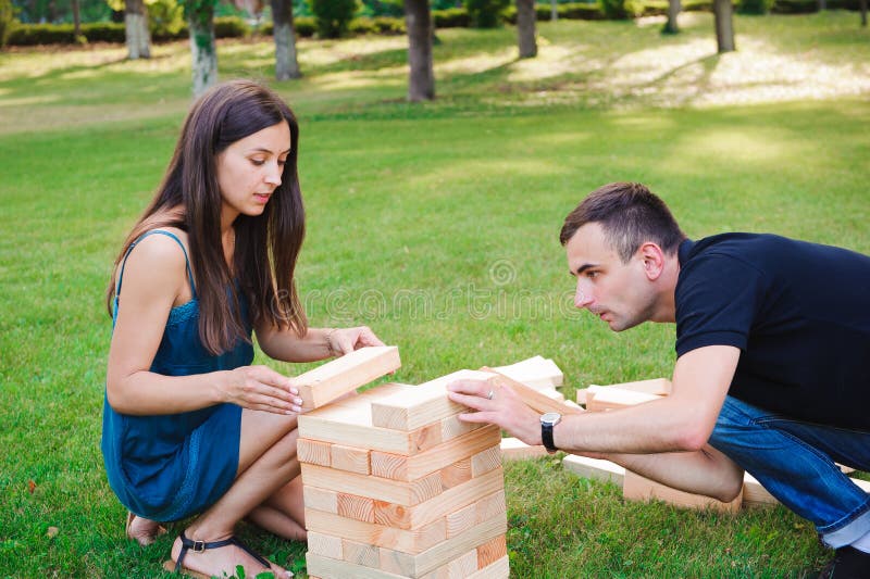 Giant Outdoor Block Game Game on the Green Grass. Stock Photo - Image ...