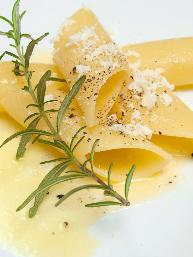 Giant Pasta with Butte and Parmesan Stock Image - Image of italy, black ...