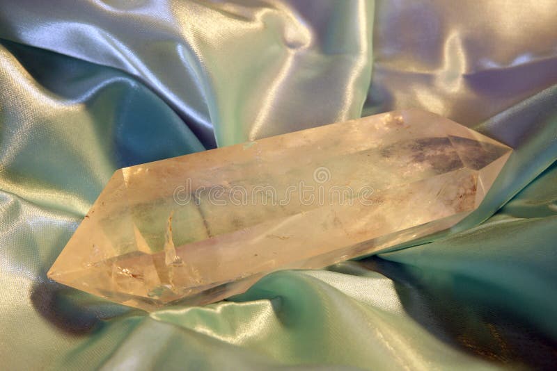 Giant Quartz Crystal Wand on Satin Stock Photo - Image of large ...
