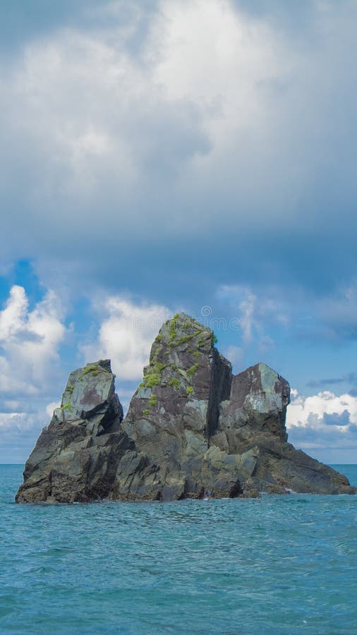 The Giant Rock Under the Sea Stock Photo - Image of island, cound ...
