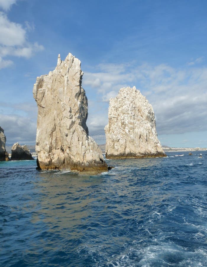 Giant Rocks in the ocean stock photo. Image of visit - 25442468