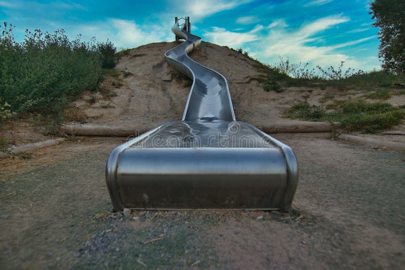 Giant Slide with Blue Sky and Some Kids Playing Editorial Stock Photo ...