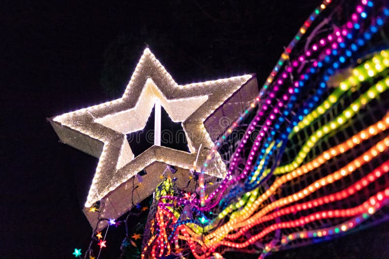 Giant Start with Attached Wavy LED Strings Shape a Falling Star Stock ...