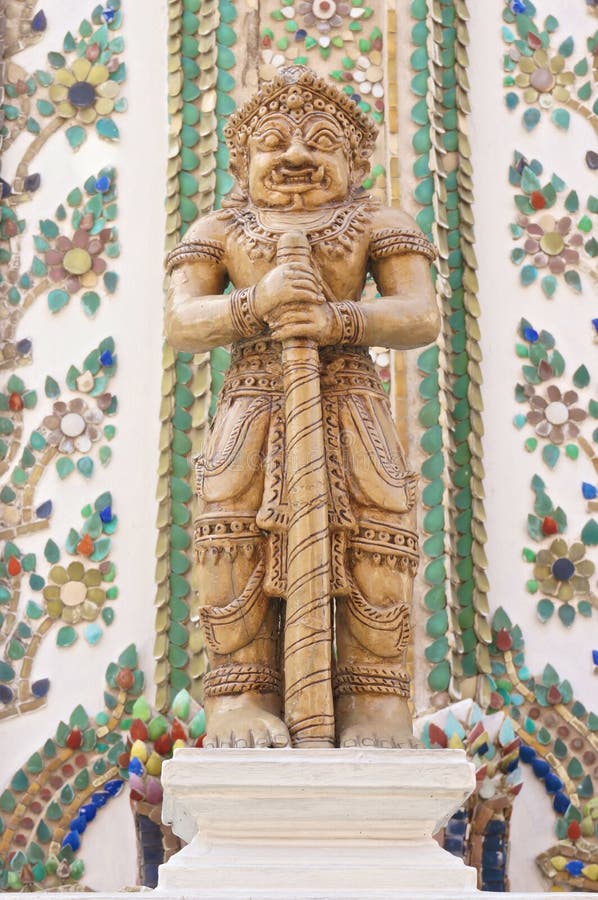 A Giant Statue Hold Baton at Wat Pho Stock Image - Image of religion ...