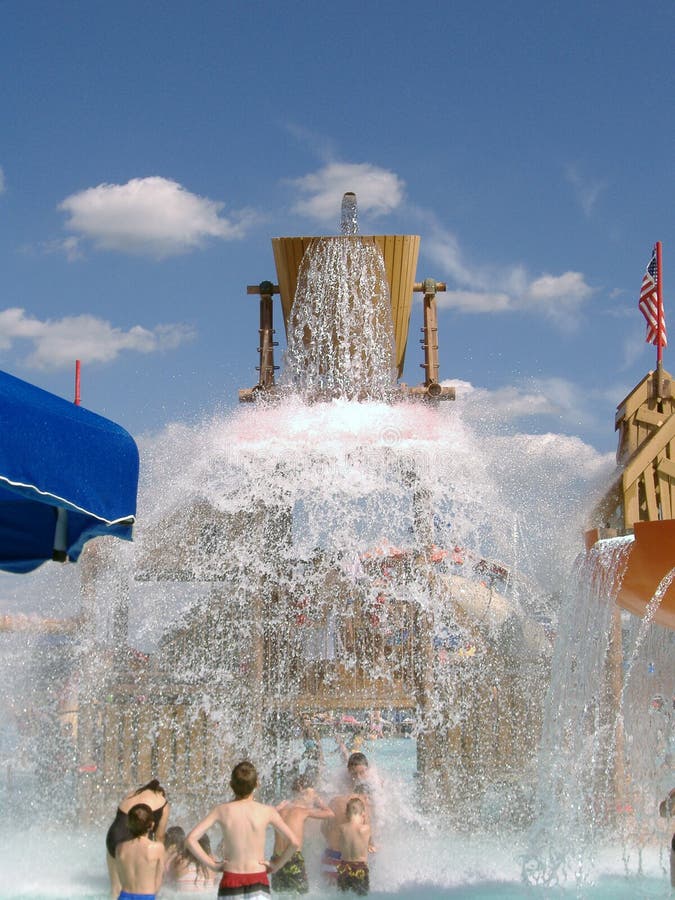 Giant Water Bucket Spills KERSPLASH! Stock Image - Image of teenagers ...