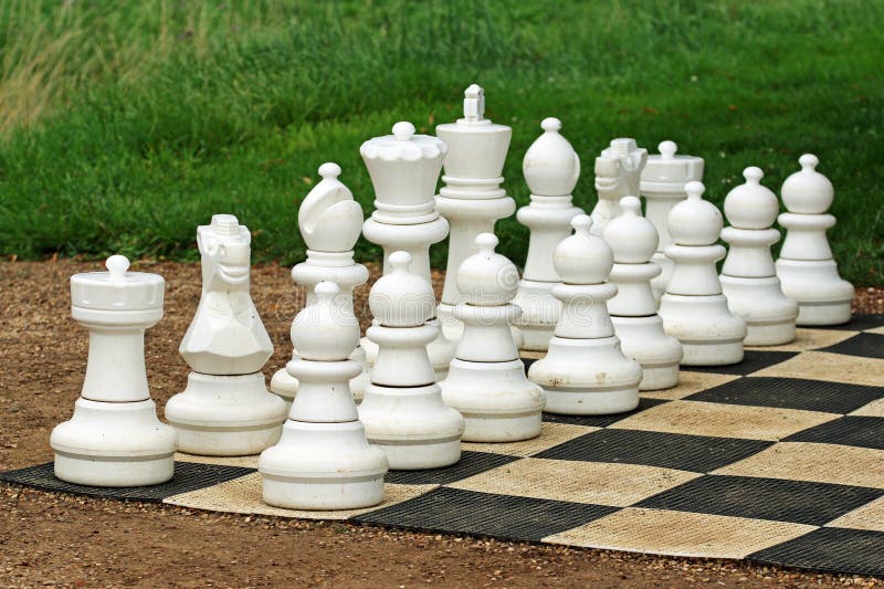 Giant White Outdoor Chess Set Pieces on a Board Stock Photo - Image of ...