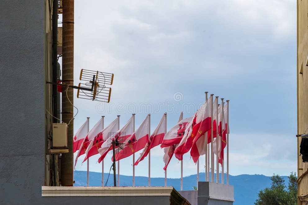 Gibraltar British Overseas Teritory Flags in a Row Stock Photo - Image ...