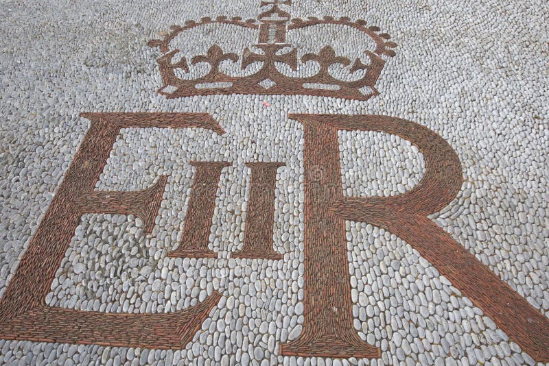 Queen Elizabeth II Crest on a Cobblestone Road in Gibraltar Editorial ...