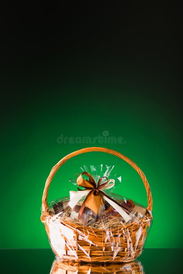 Gift Basket on Green Background Stock Image - Image of holiday, packing ...
