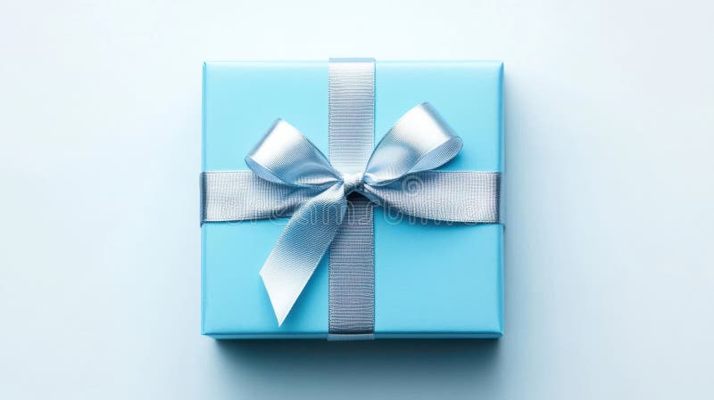 Gift in a Blue Box with a Silver Ribbon Set Against a Clean White ...
