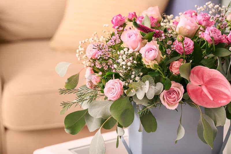 Gift Box with Beautiful Flowers on Table Indoors, Closeup Stock Image ...