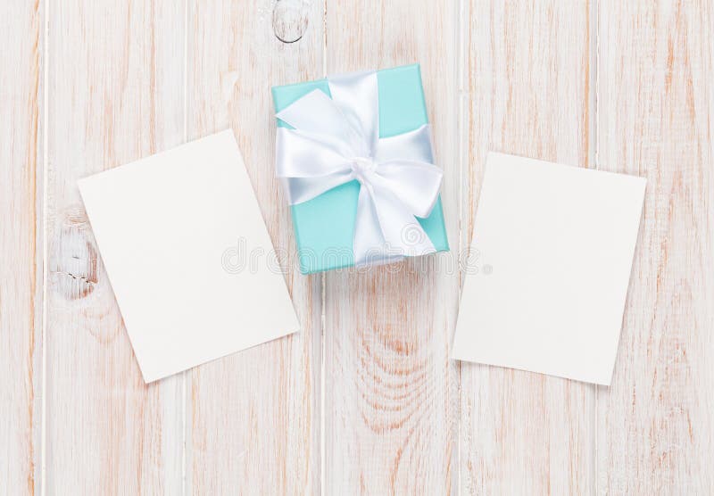 Gift Box and Blank Photo Frames Stock Image - Image of blue, design ...