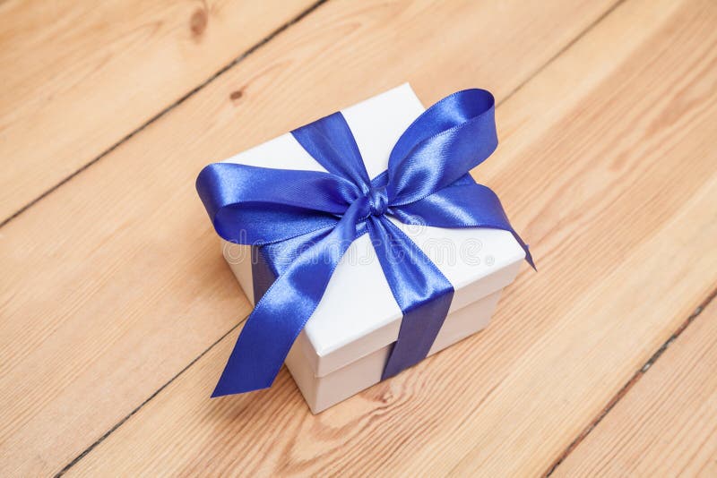 Gift box with blue ribbon stock photo. Image of wrap - 39337684