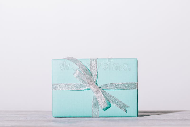 Gift Box in Blue Wrapping Paper with Silver Ribbon Stock Image - Image ...