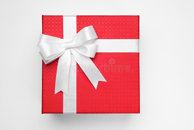 Gift Box with Bow on Light Grey Background, Top View Stock Photo ...