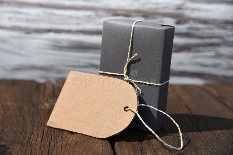 Gift Box with Bow on Wood Table Front View Stock Photo - Image of gift ...