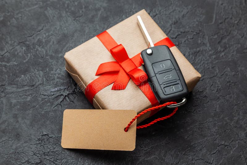 Gift Box with Car Keys with Remote Control Alarm System with Red Ribbon ...