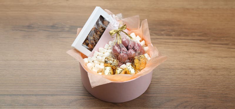 Gift Box with Chocolate and Sweets on Wooden Table Stock Image - Image ...
