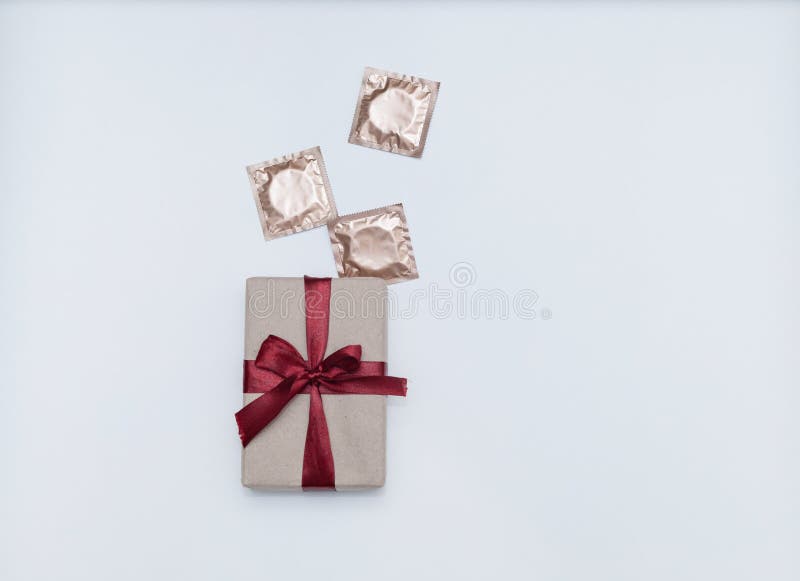 Gift box with condoms stock photo. Image of package - 344693126