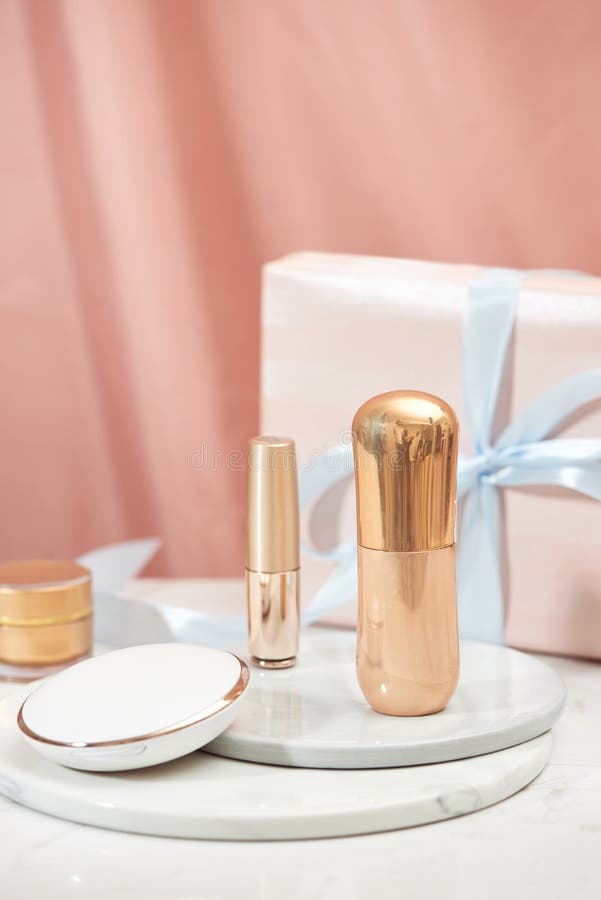 Gift Box Decorated with Ribbon Filled with Cosmetics Stock Photo ...