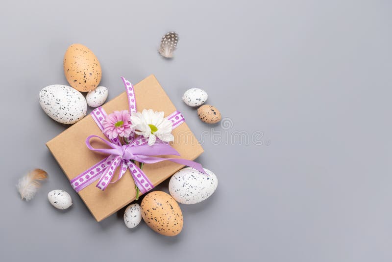 Gift Box, Easter Eggs and Flowers Stock Image - Image of feather ...