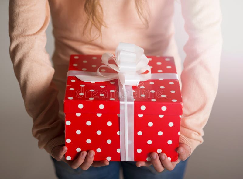 Gift box in hand stock image. Image of hand, festive - 35617859
