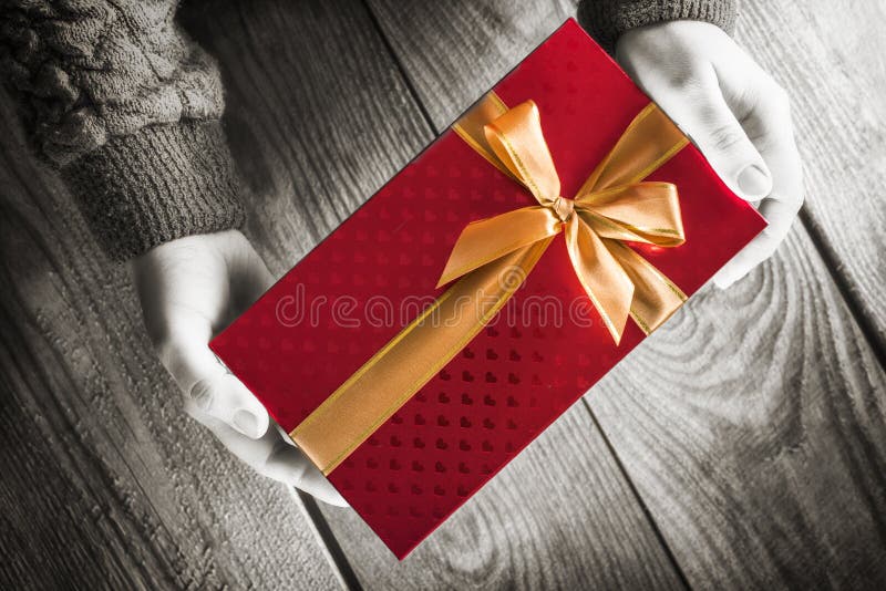 Gift box in hand stock photo. Image of focus, pattern - 98549084