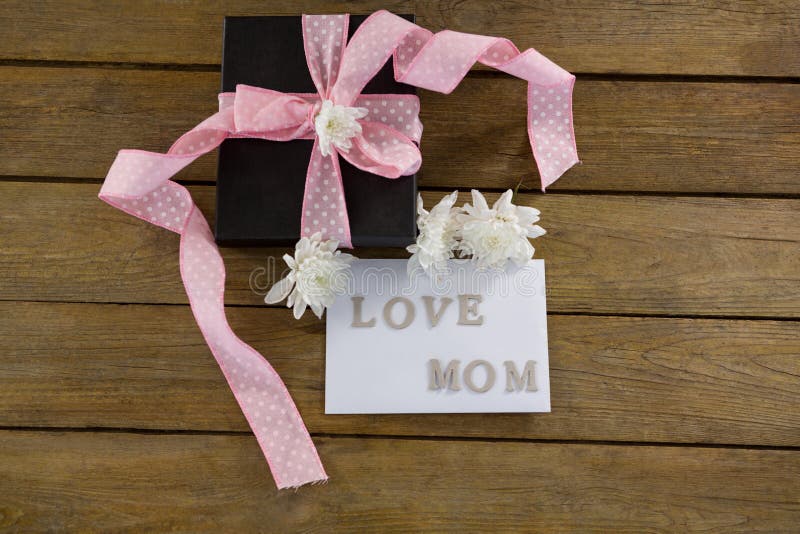 Gift Box with Love Mom Text on Wooden Plank Stock Image - Image of ...
