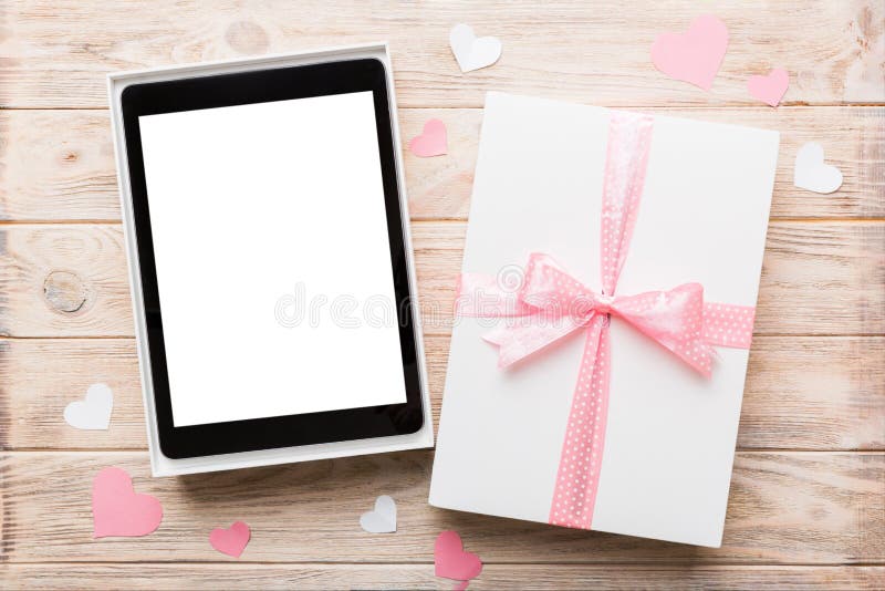 Gift Box of Open Tablet for the Holidays with a Bow Top View Stock ...