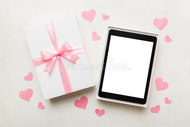 Gift Box of Open Tablet for the Holidays with a Bow Top View Stock ...