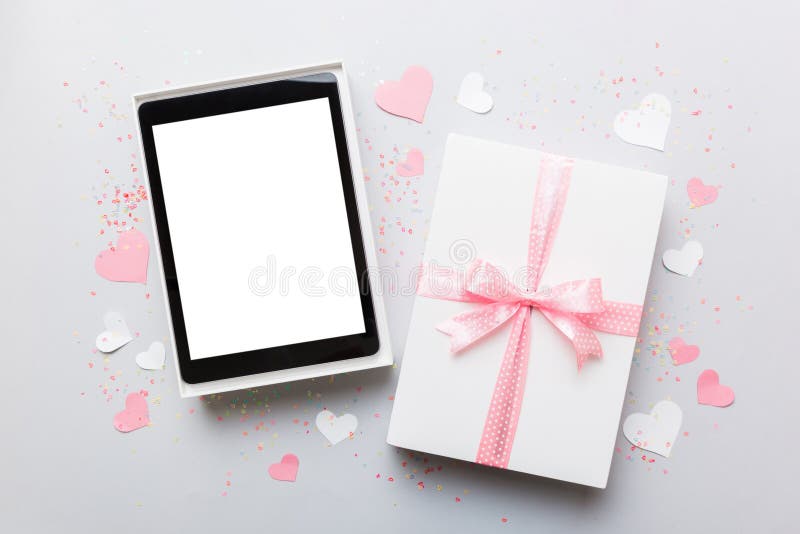 Gift Box of Open Tablet for the Holidays with a Bow Top View Stock ...