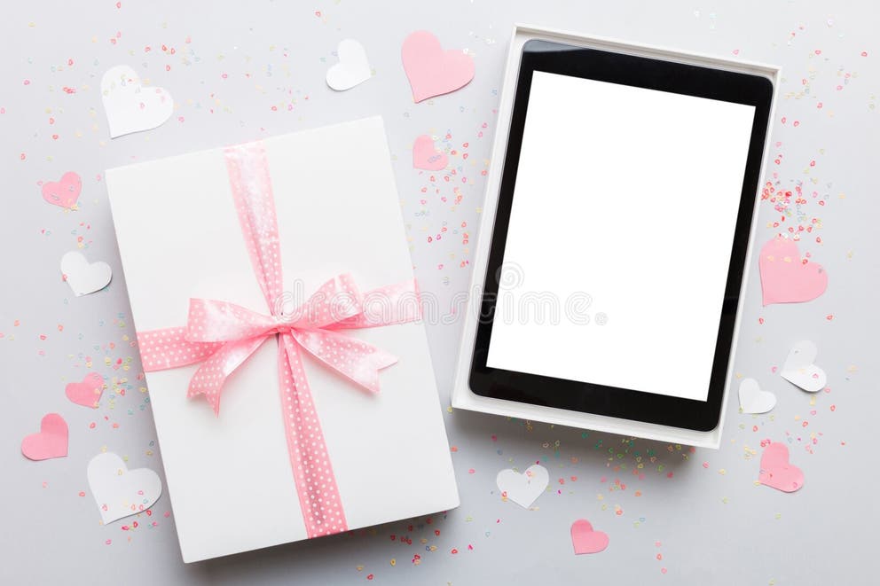 Gift Box of Open Tablet for the Holidays with a Bow Top View Stock ...