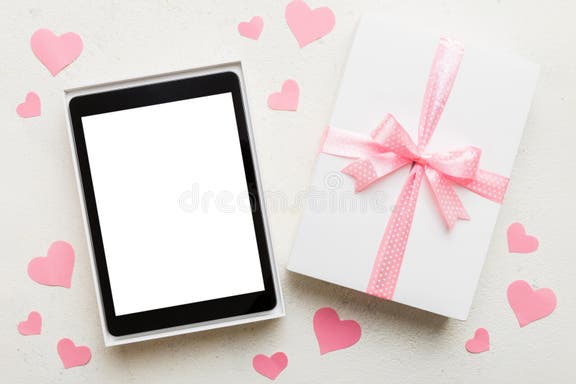 Gift Box of Open Tablet for the Holidays with a Bow Top View Stock ...