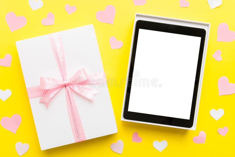 Gift Box of Open Tablet for the Holidays with a Bow Top View Stock ...
