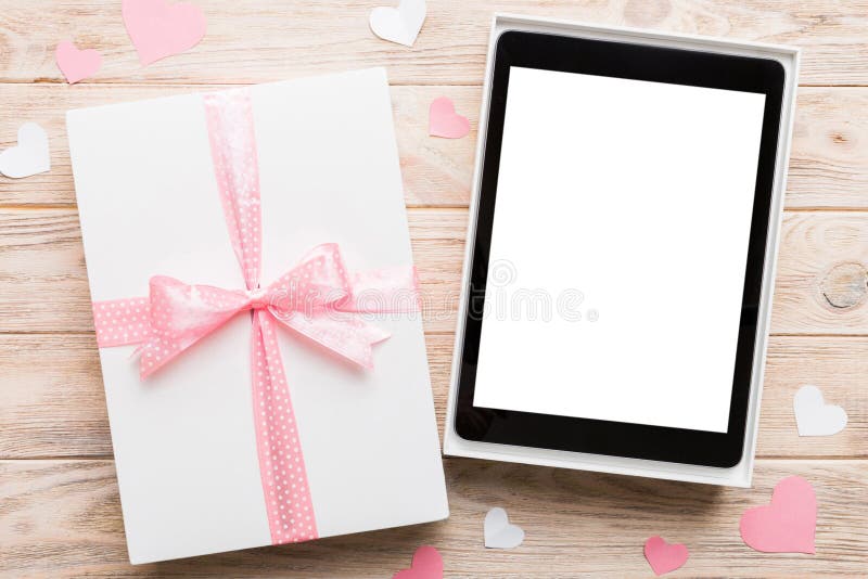 Gift Box of Open Tablet for the Holidays with a Bow Top View Stock ...