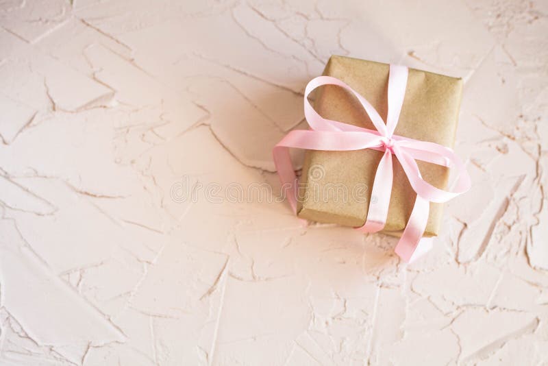 Gift Box on Pink Table Top View. Flat Layout for Birthday, Mothers Day ...
