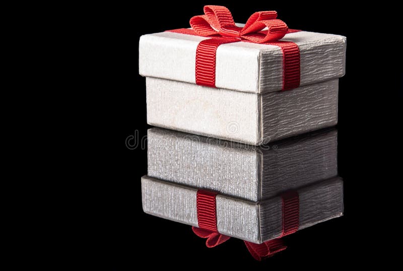 Gift Box with Red Ribbon Isolated on Black with Reflection Stock Image ...