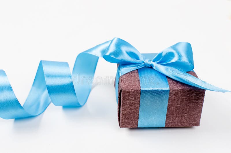 Gift Box with Ribbon in Blue and Brown Stock Image - Image of ...