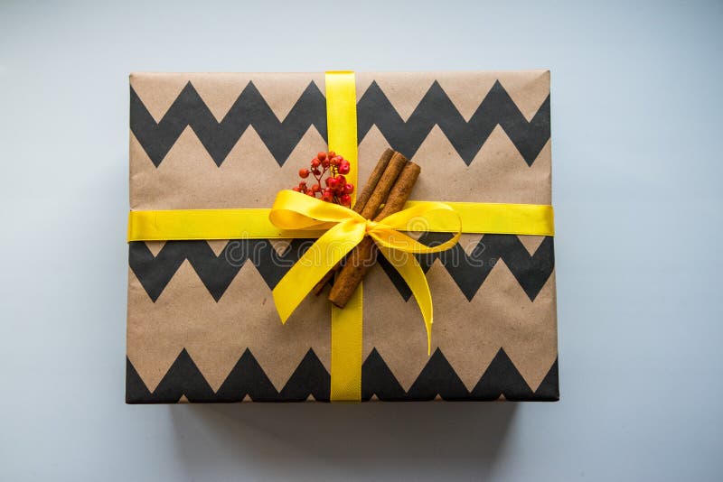 Gift with a Yellow Ribbon / Gift Box Tied with a Yellow Ribbon Stock ...