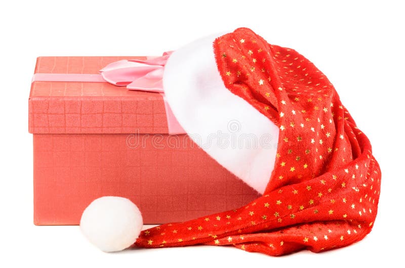 Gift box under santa hat stock image. Image of santa - 27904581