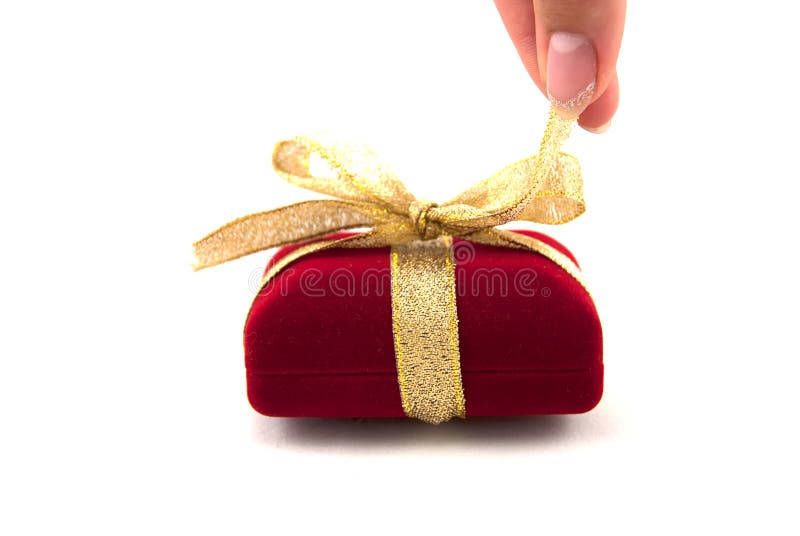 Gift box unwrapping stock image. Image of golden, ribbon - 15409849