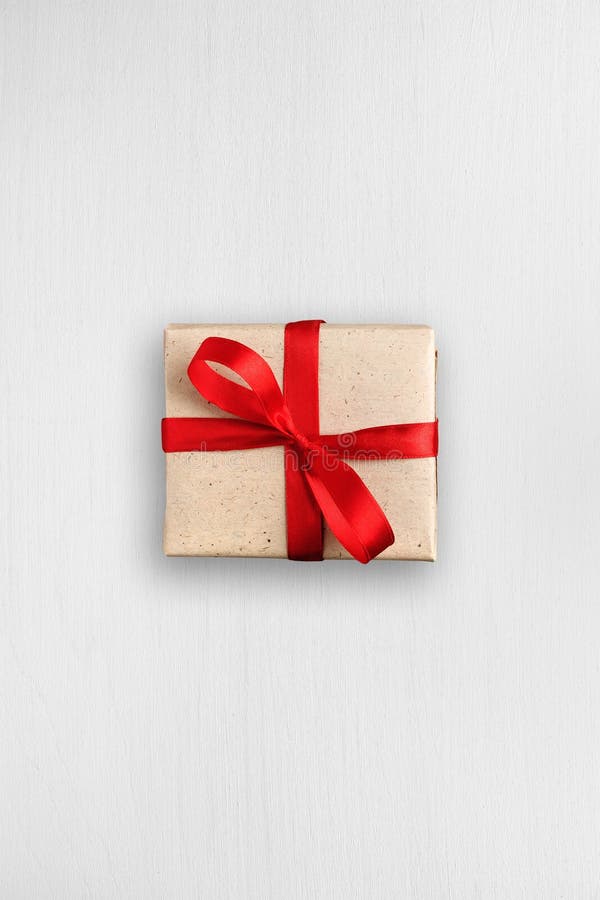 Gift box on white table stock image. Image of wooden - 62517327