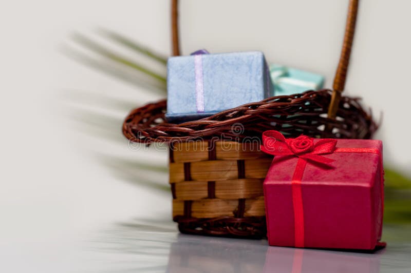 Gift Boxes and Wicker Basket Stock Photo - Image of rush, holiday: 44117772