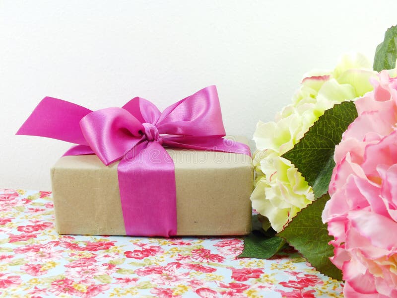 Gift Box Wrapped in Recycled Paper and Bow Stock Image - Image of post ...