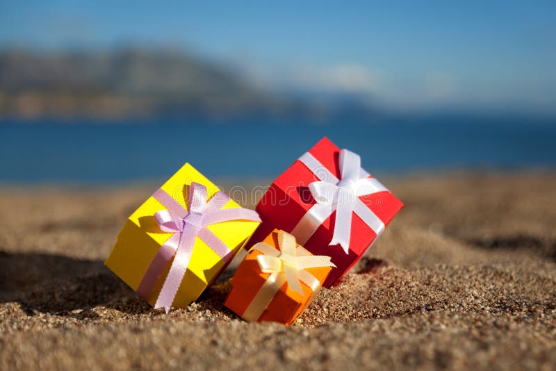 Gift boxes in a beach stock image. Image of outdoor, close - 79268895