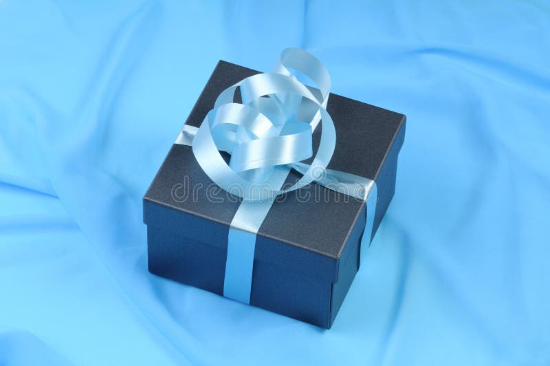 Gift Boxes with Blue Ribbon on Silk Stock Photo - Image of reflection ...