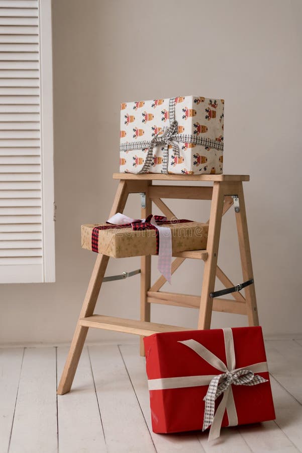 Gift boxes on the chair stock image. Image of holiday - 202916907