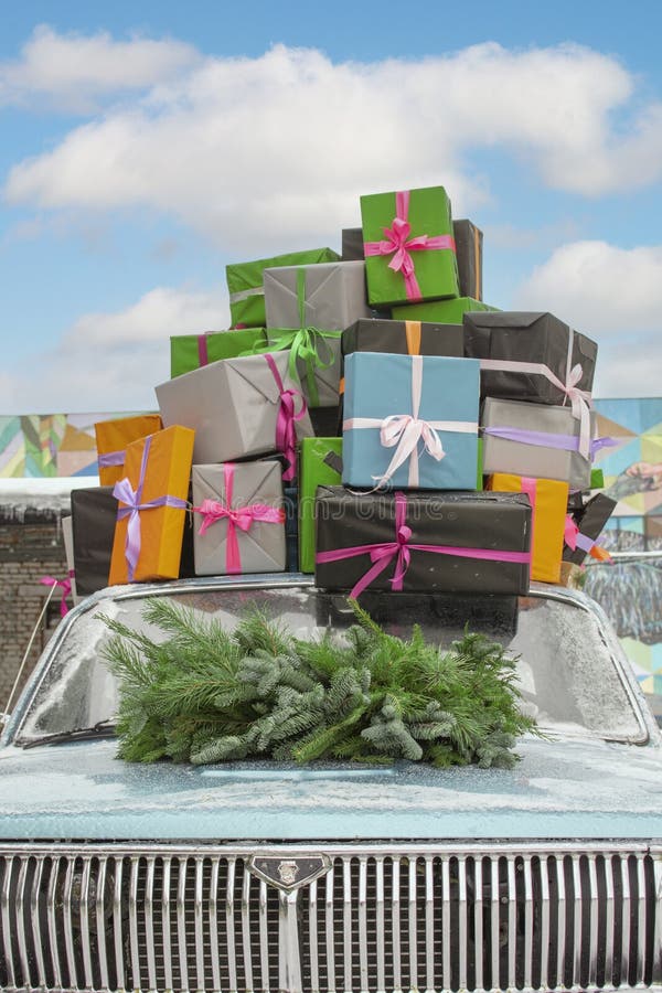 Gift Boxes for Christmas and New Year on the Roof of the Car. Christmas ...