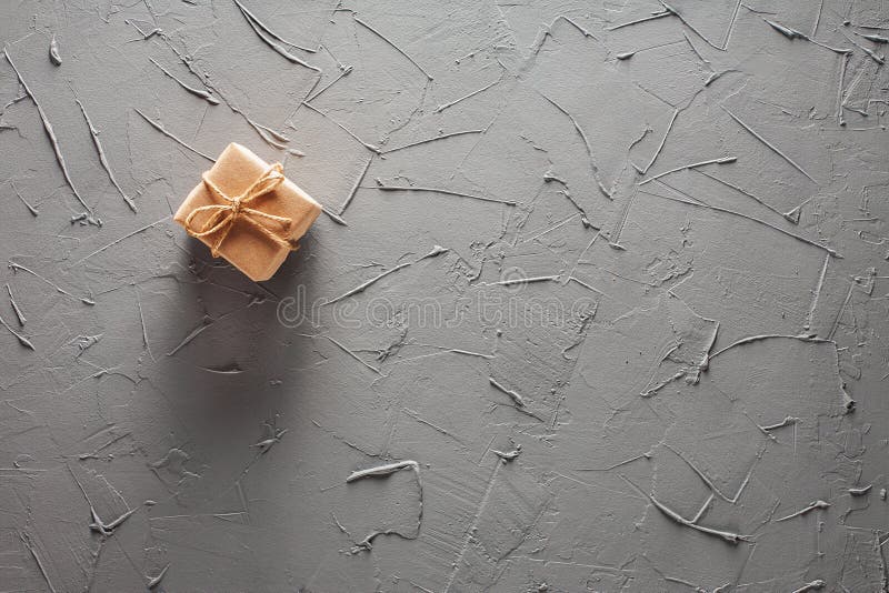 Gift Boxes in Craft Paper on a Concrete Background Stock Image - Image ...